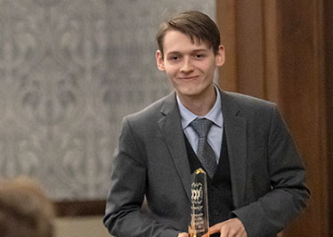 Debater Carnley earns All-American status, team closes season - Grove ...